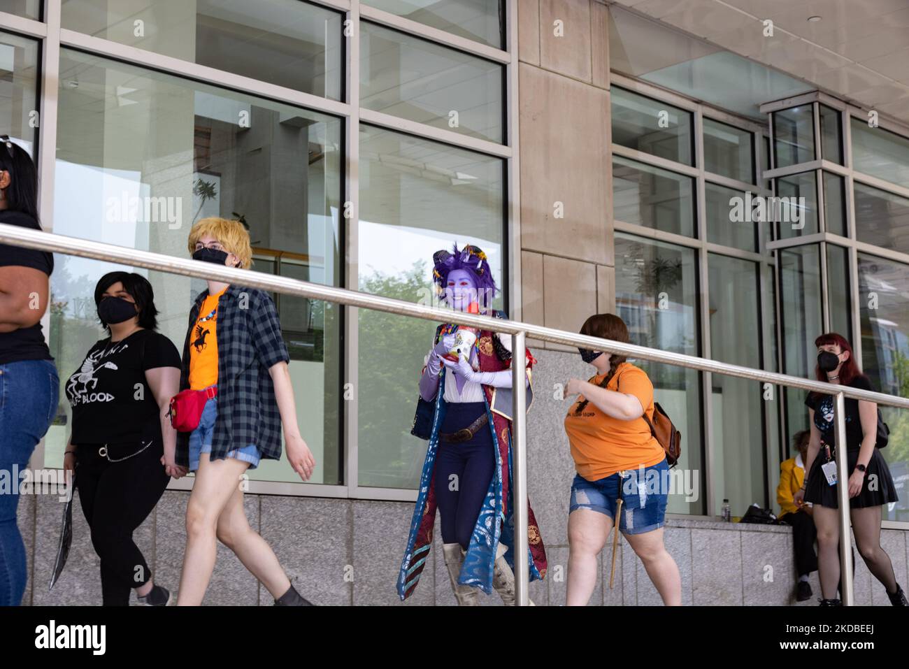 People in costume attend the 2022 Awesome Con comic convention at the ...