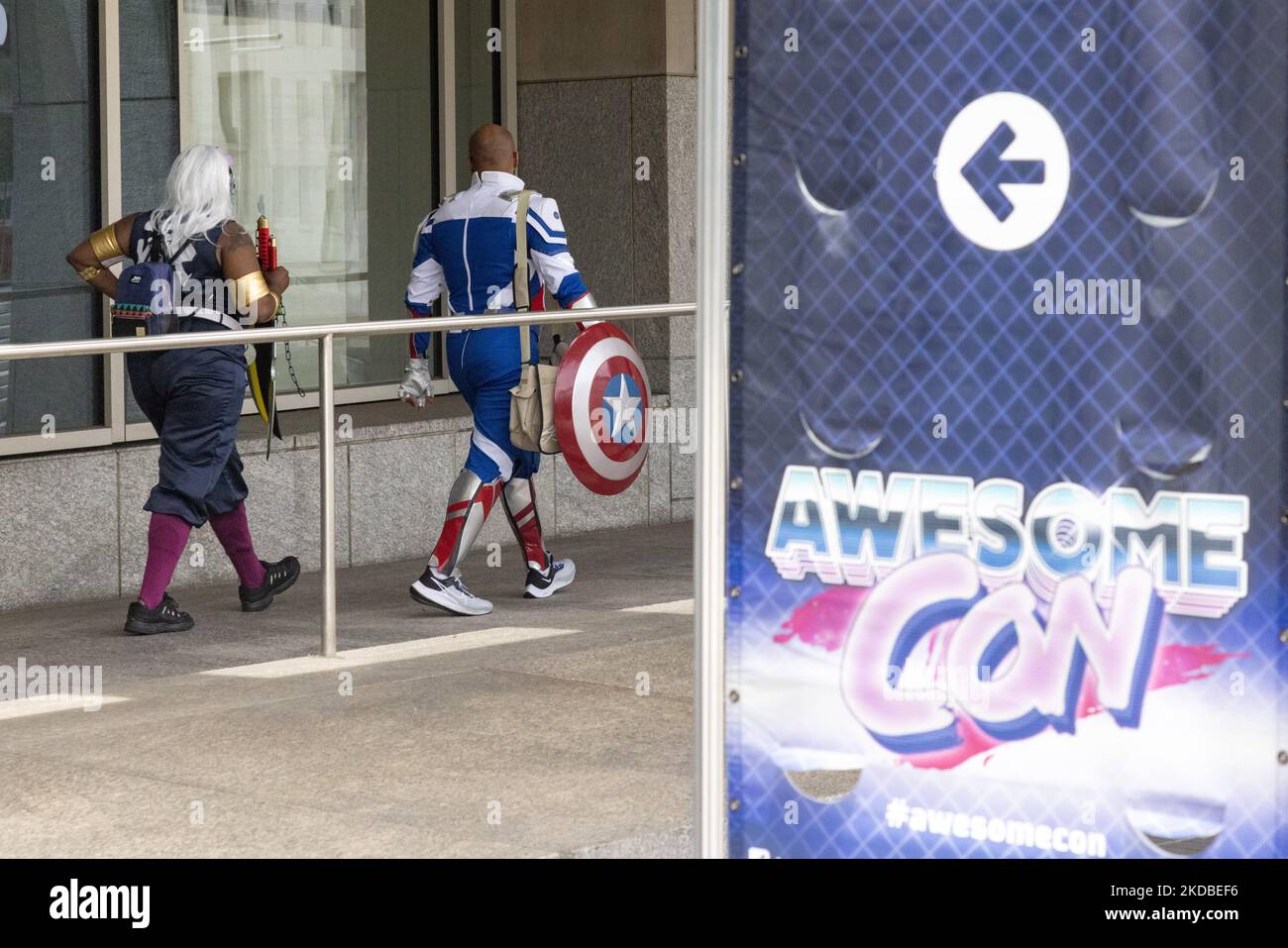 People in costume attend the 2022 Awesome Con comic convention at the ...