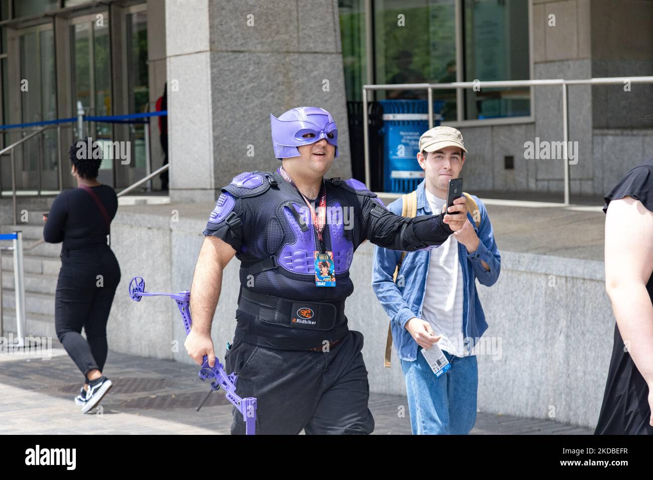 People in costume attend the 2022 Awesome Con comic convention at the ...
