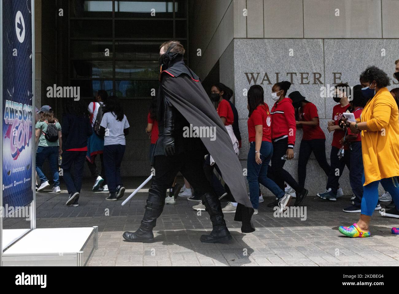 People in costume attend the 2022 Awesome Con comic convention at the ...
