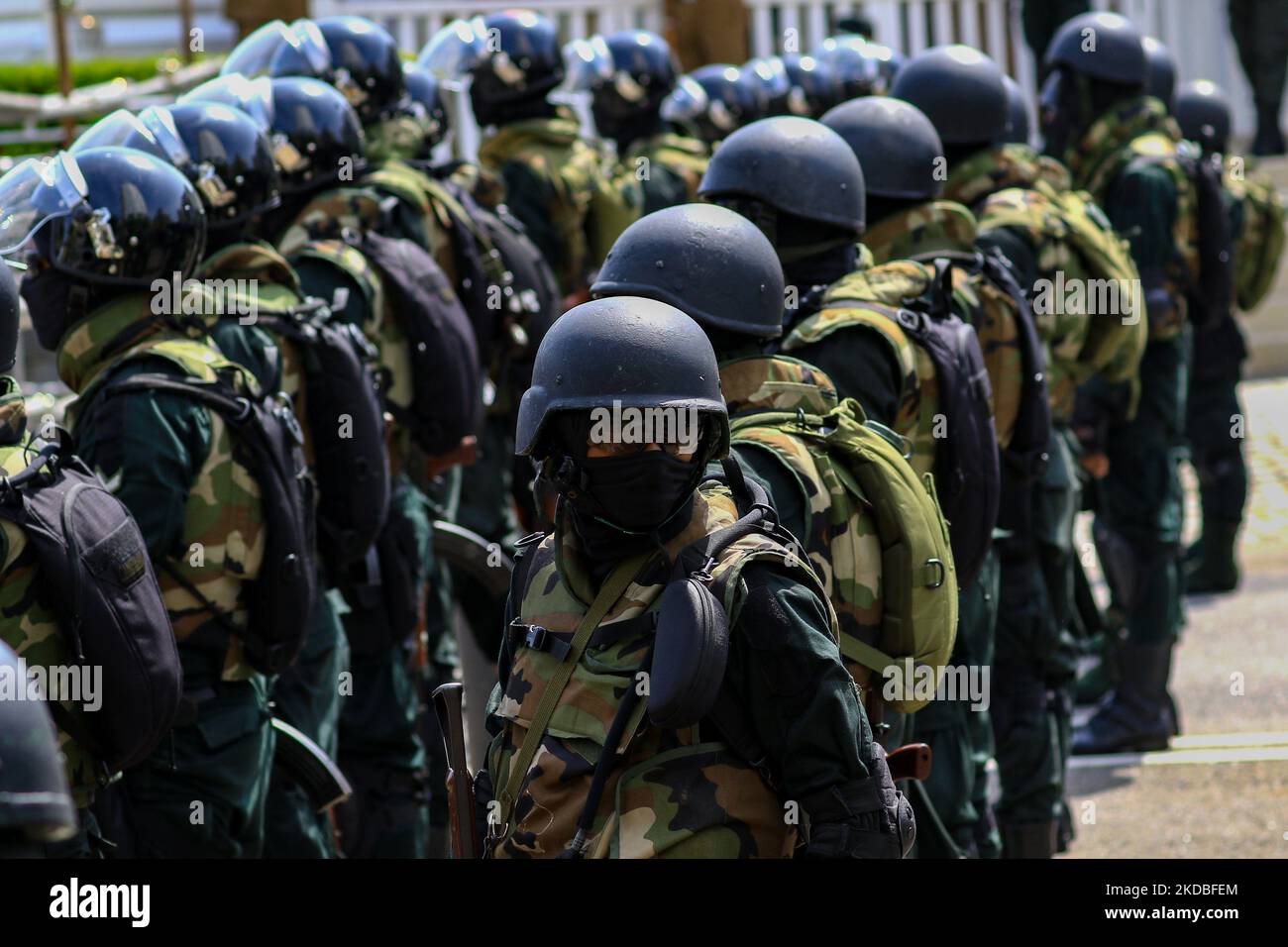 Sri Lankan army soldiers guard the road leading to the main entrance of ...