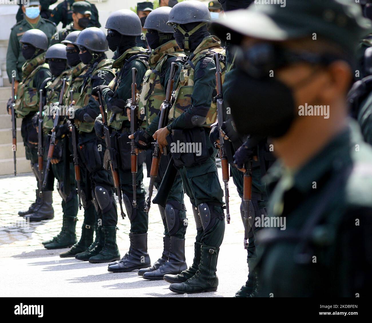 Sri Lankan army soldiers guard the road leading to the main entrance of ...