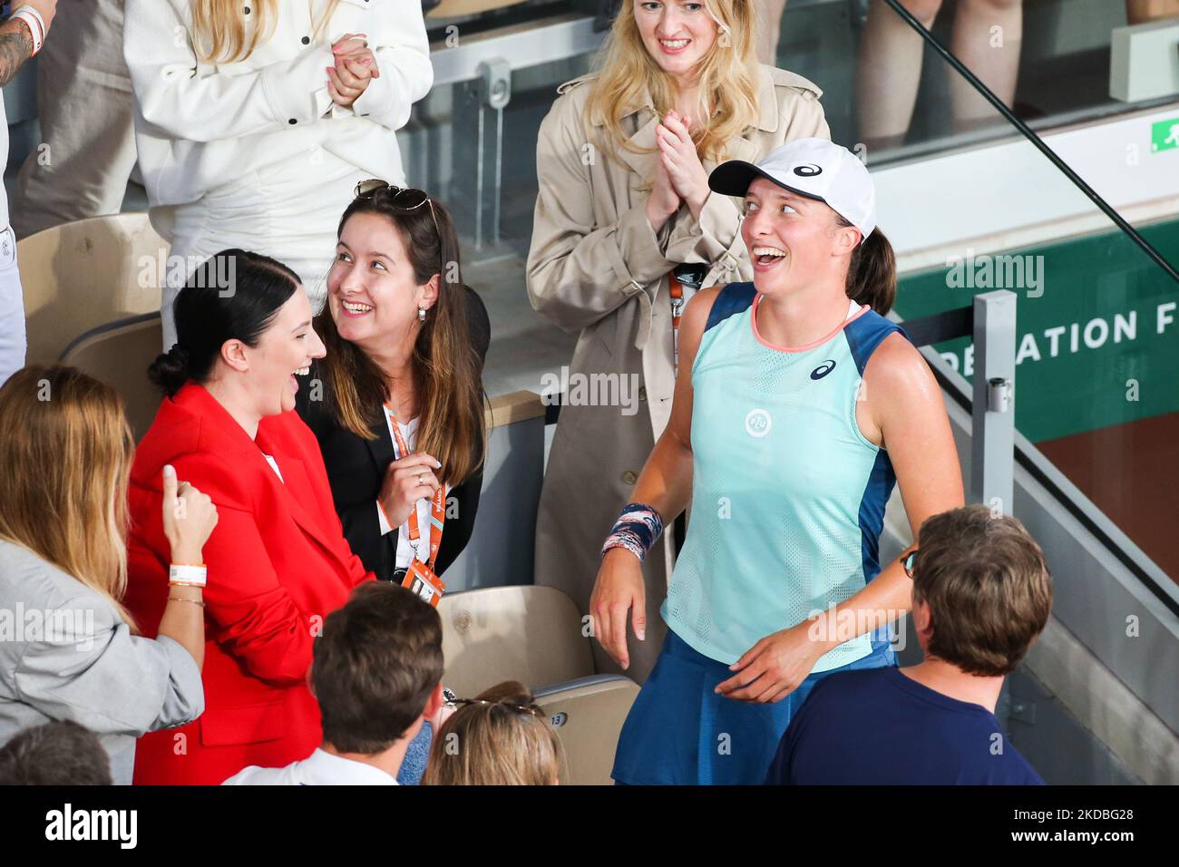 Iga Swiatek celebrating her win against Coco Gauff on Philipe Chatrier ...