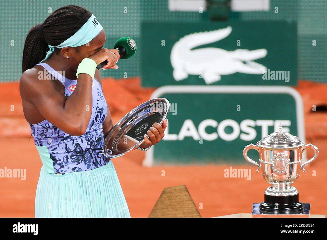 Coco Gauff posing for photos with Roland Garros second place trophy after her defeat against Iga ...