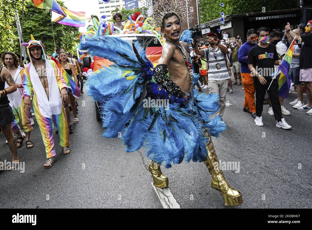 Members of the LGBT community take part in the parade to mark pride day 2022 in Bangkok ...