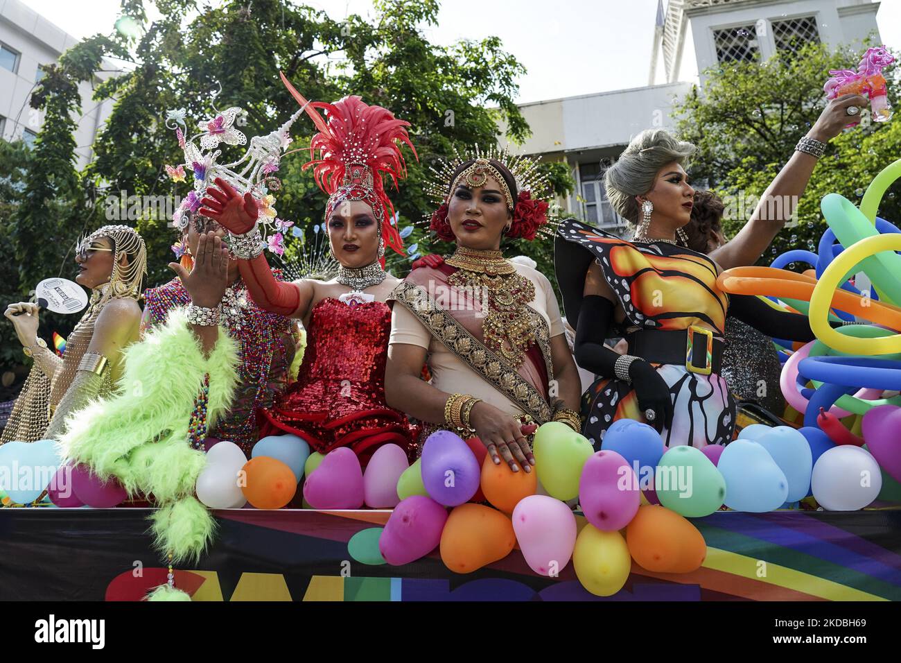 Members of the LGBT community take part in the parade to mark pride day 2022 in Bangkok ...