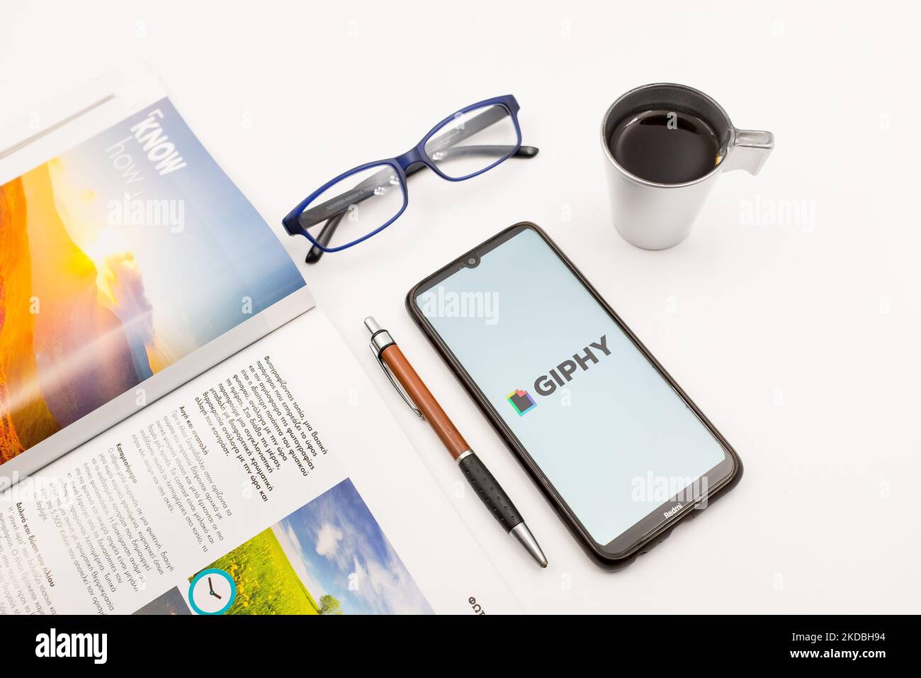 In this photo illustration a Giphy logo seen displayed on a smartphone ...