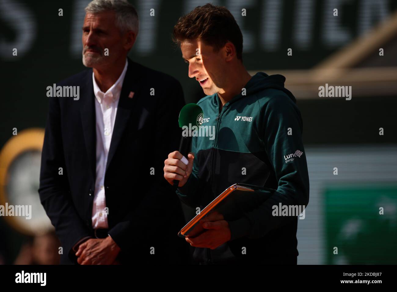 Norway's Casper Ruud holds the second place trophy following his match ...