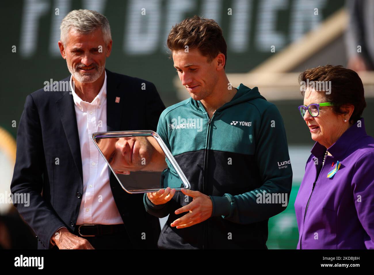 Norway's Casper Ruud holds the second place trophy following his match ...
