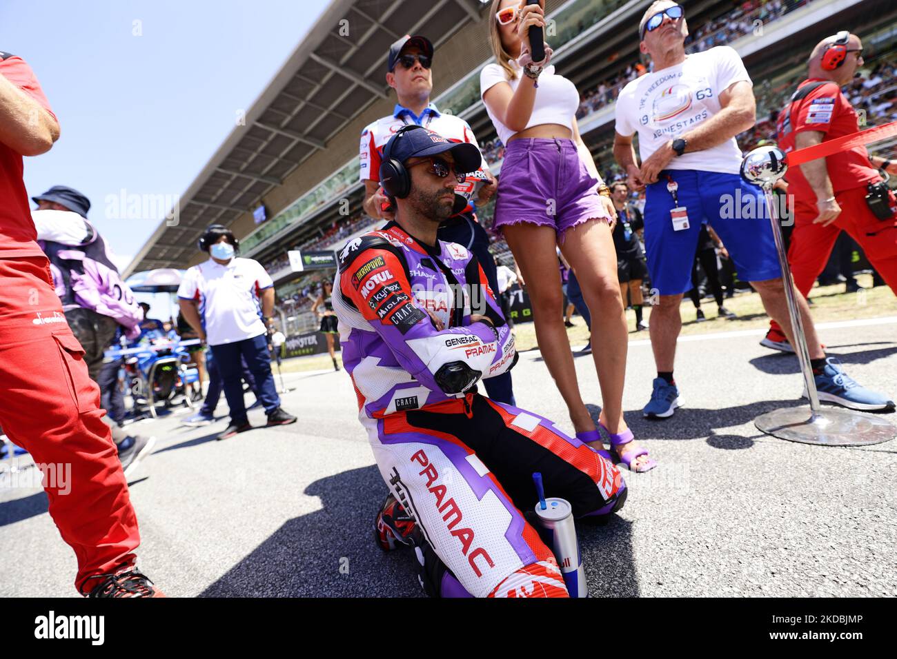 Johann Zarco, from France, kneeling down before the start of the the ...
