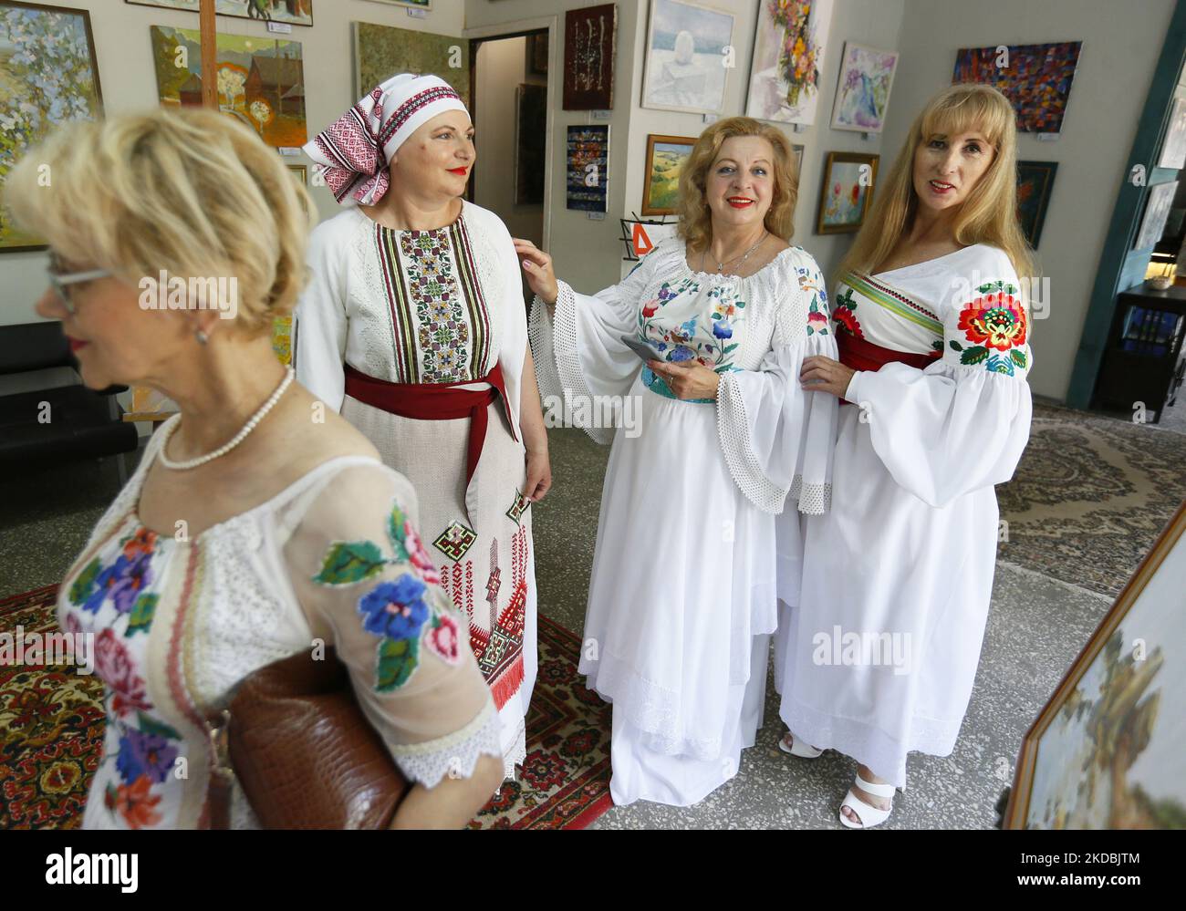 Ukrainian age plus models wearing traditional embroidered clothing wait ...