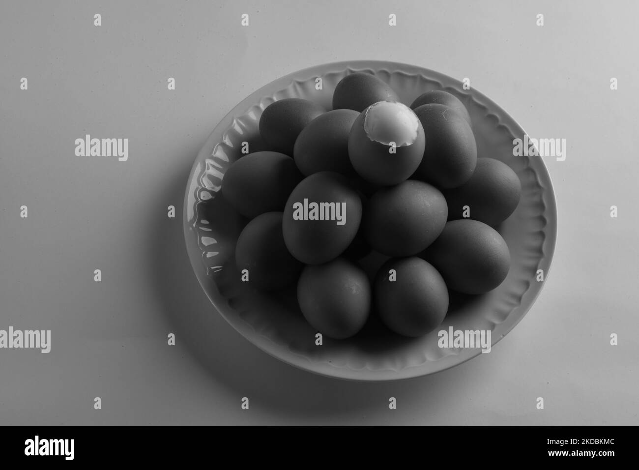 A top view of eggs on a plate in black and white Stock Photo - Alamy