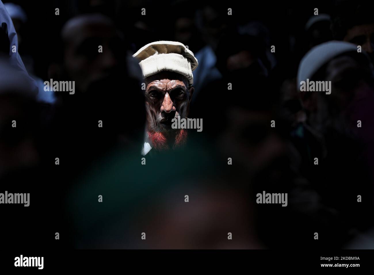 A worker of Congress from Gujjar and Bakarwal community listens to ...