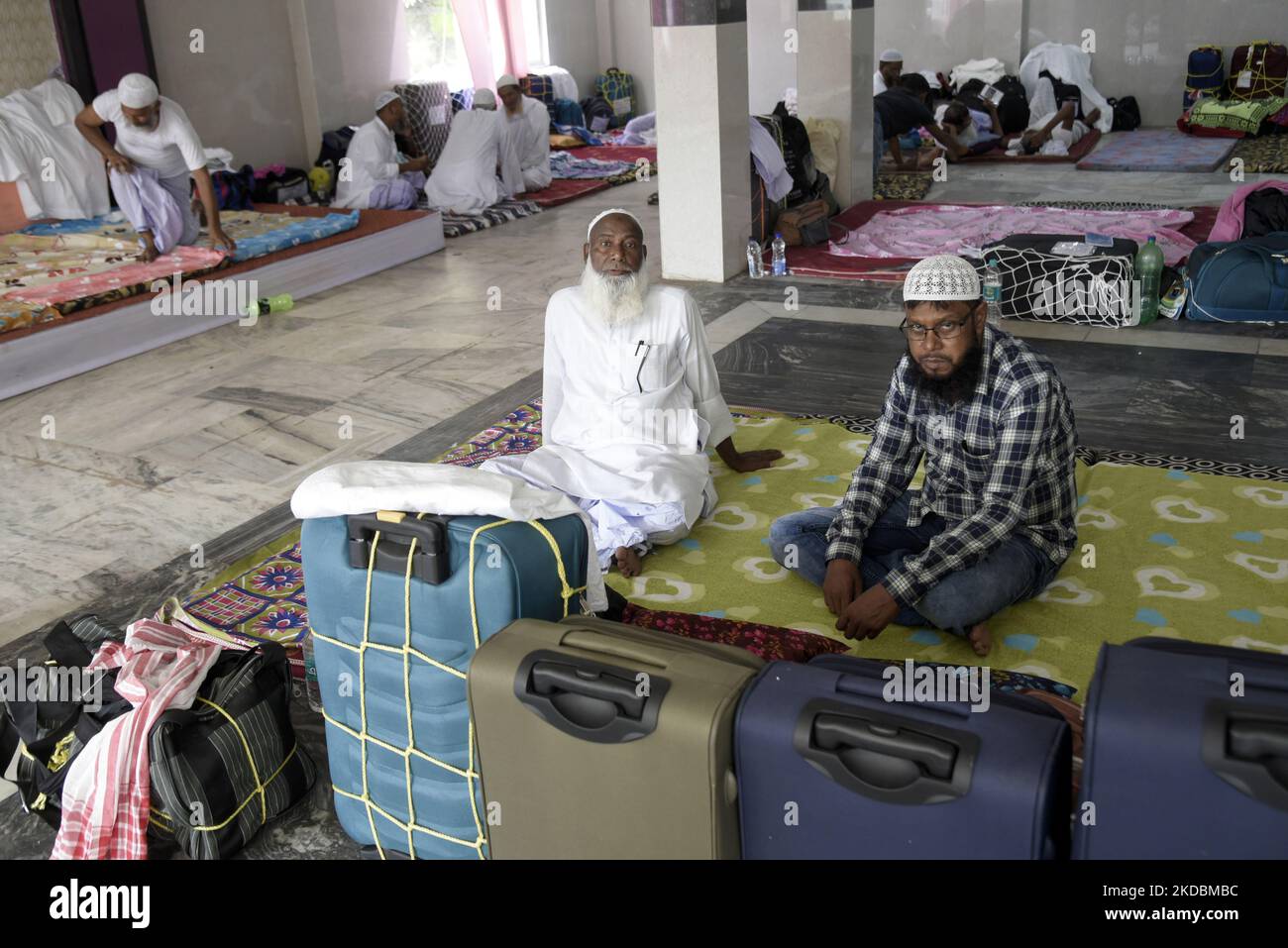 Hajj pilgrims takes rest at Guwahati Musafir Khana as they prepare to ...