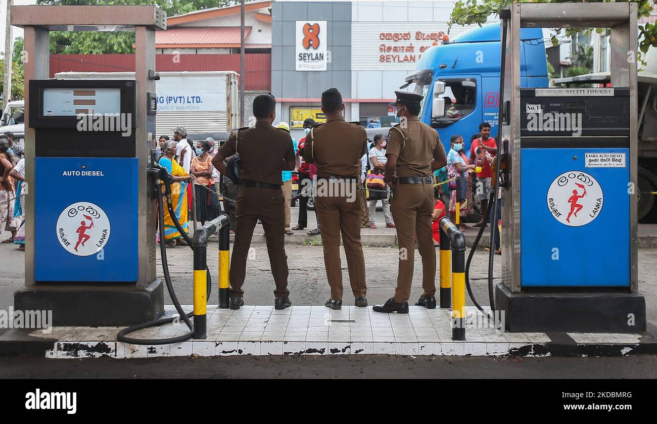 Sri Lankan police secure a petrol station in Colombo On June 7, 2022 ...