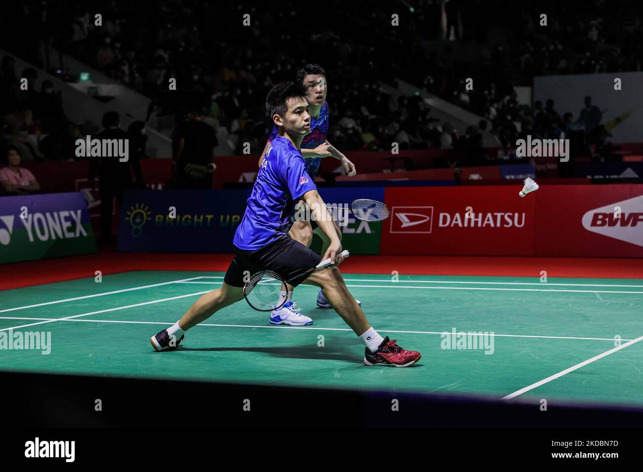 Tan Wee Kiong (R) and Tan Kian Meng of Malaysia compete in the Men's ...