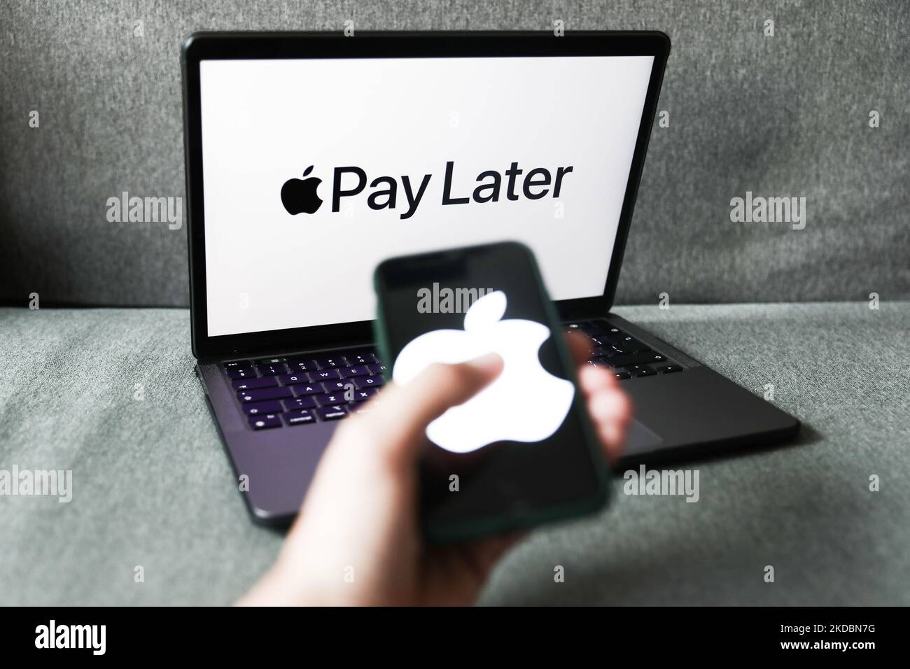 Apple Pay Later logo displayed on a laptop screen and Apple logo ...
