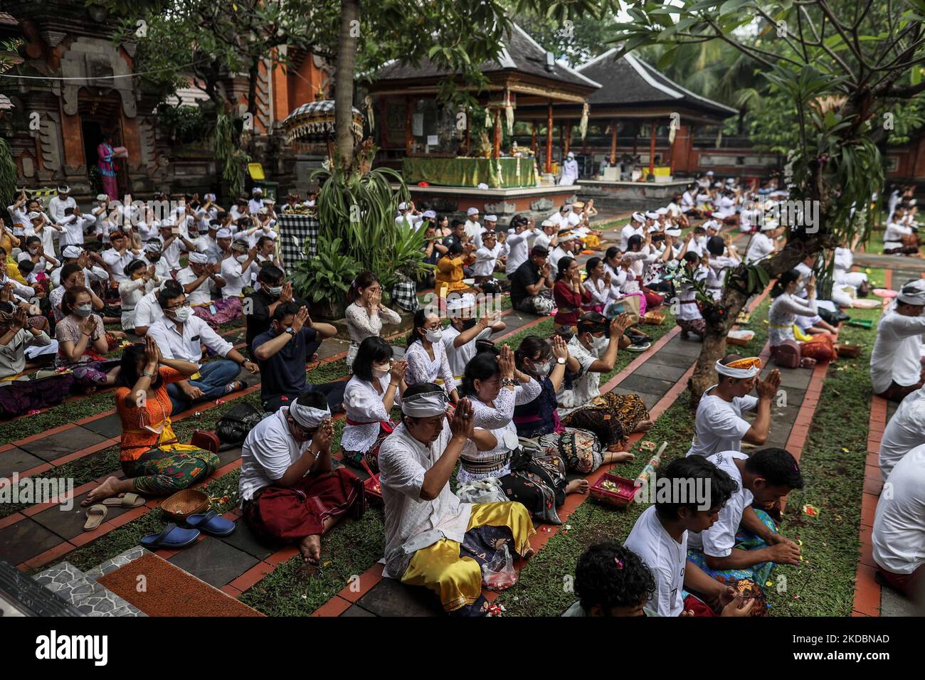 Indonesian Hindu worshippers pray at Aditya Jaya Temple while ...