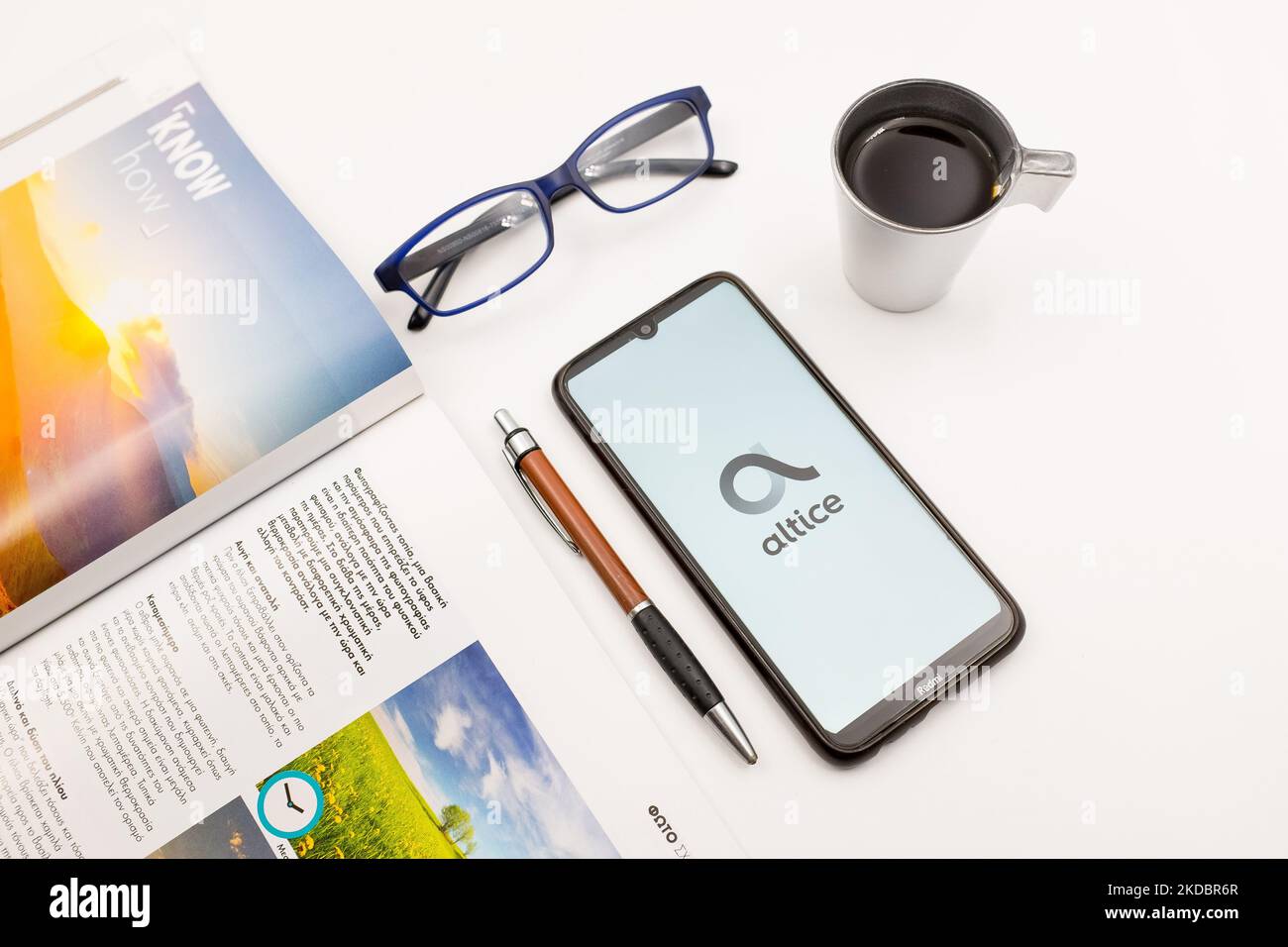 In this photo illustration an Altice logo seen displayed on a ...