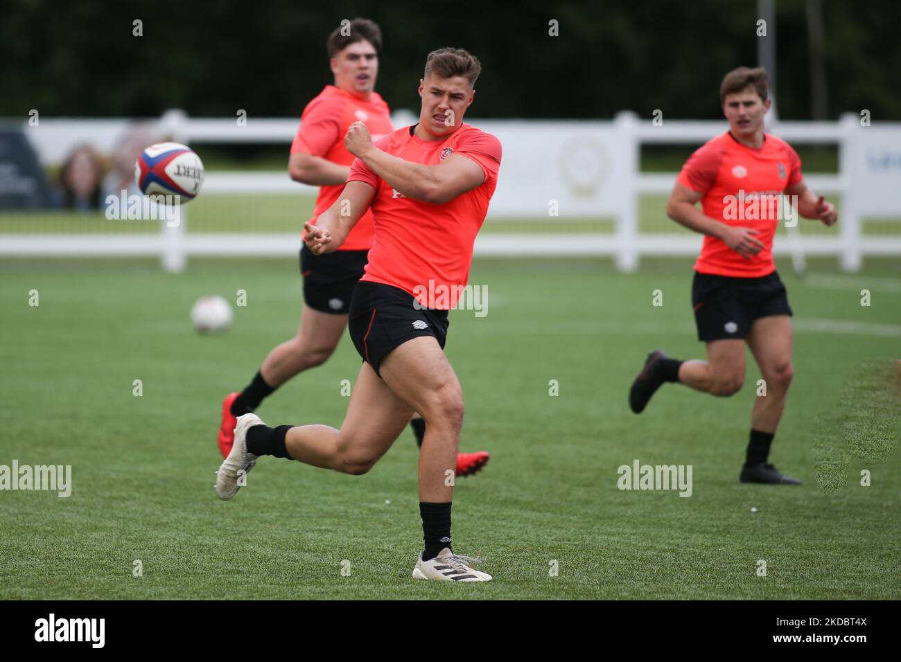 Iwen Stephens throws a pass during the England Rugby Under 20s training ...
