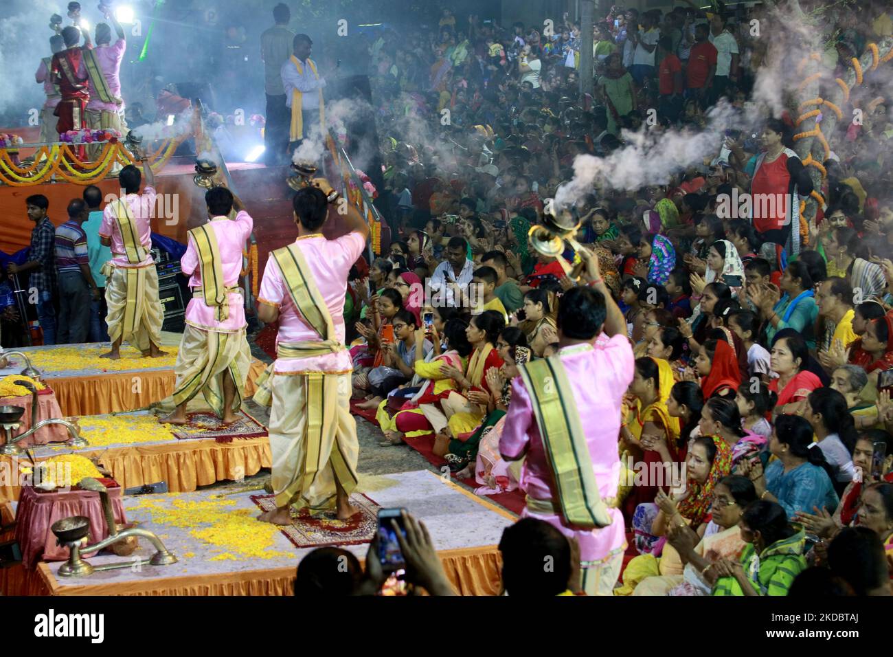 Hindu priests perform 'Ganga Aarti' prayer during a religious ceremony ...