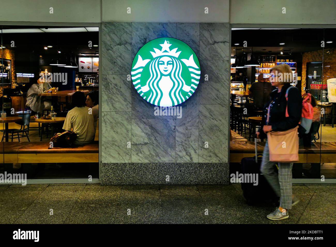 Starbucks Coffee shop at the railway station in Warsaw, Poland on June ...