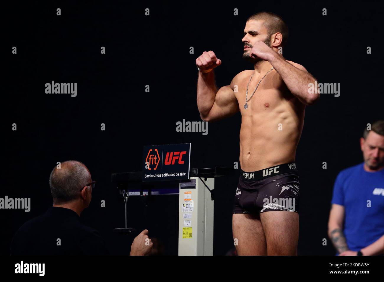 Andre Fialho of Portugal reacts on the scale during the UFC 275 Weigh ...