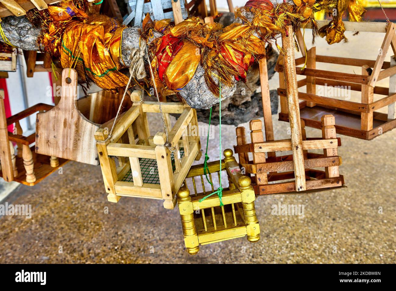 Small wooden cradles placed by Hindu families praying to have children ...