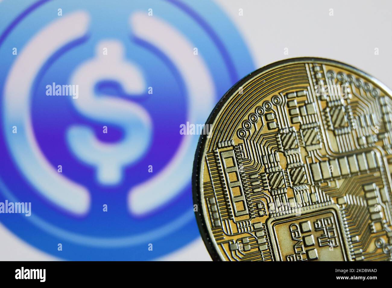 Representation of cryptocurrency and USD Coin logo displayed on a ...