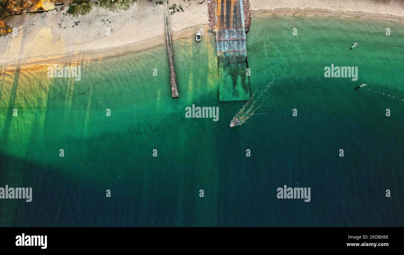 An aerial view of the boats leaving the dock Stock Photo - Alamy