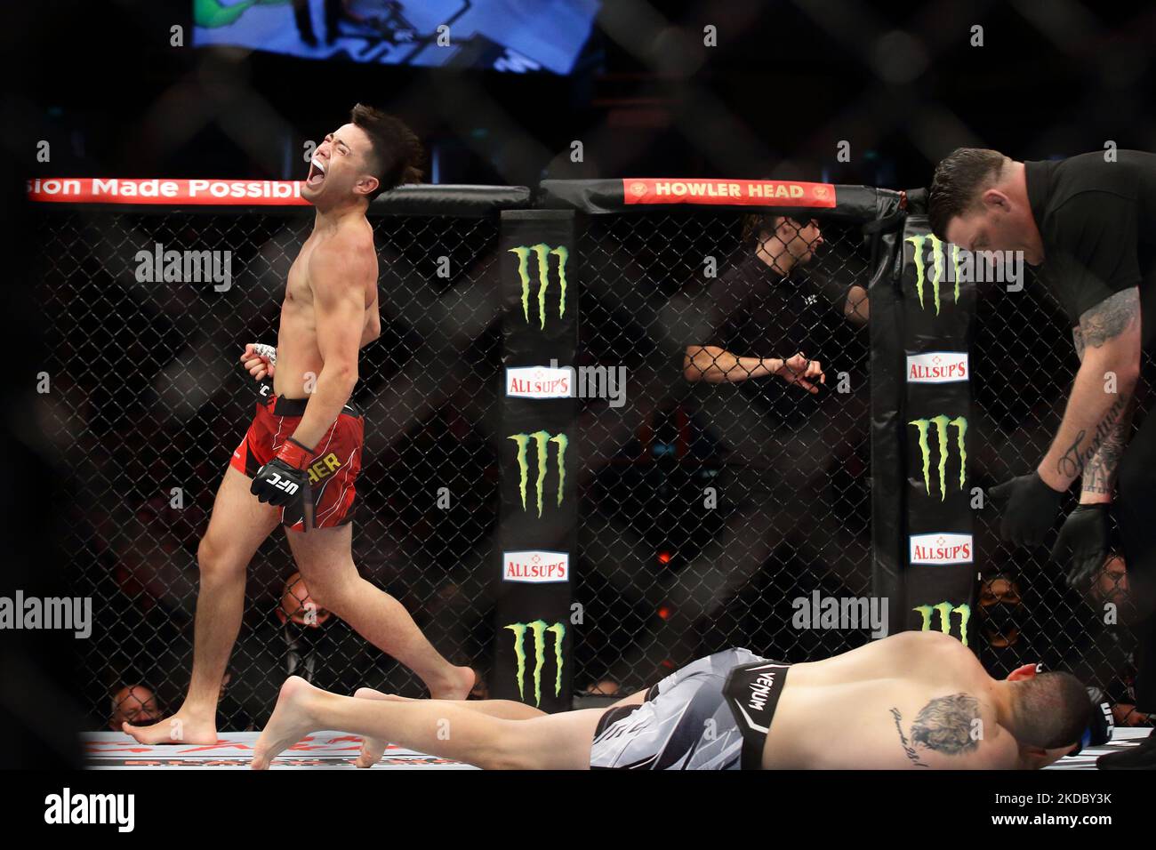 Maheshate of China (L) reacts after knocking out Steve Garcia of United ...