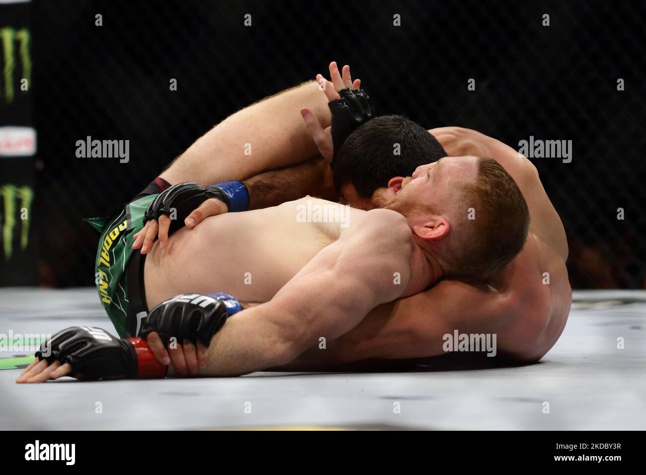 Jack Della Maddalena of Australia (front) battles Ramazan Emeev of ...