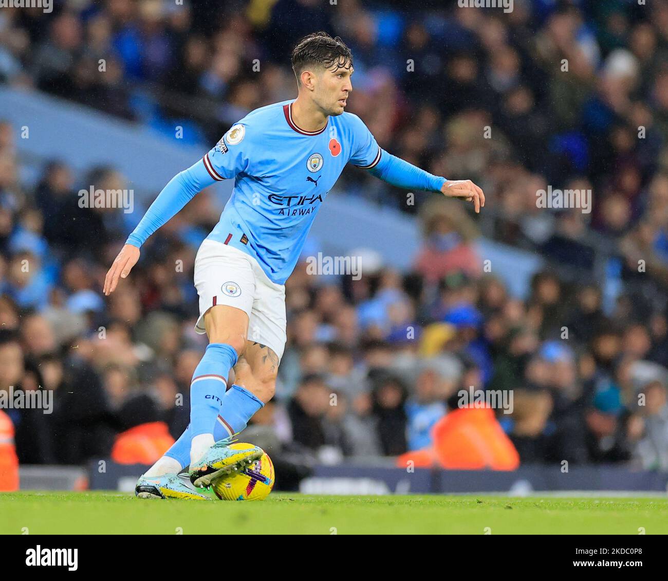 John Stones #5 of Manchester City controls the ball during the Premier ...
