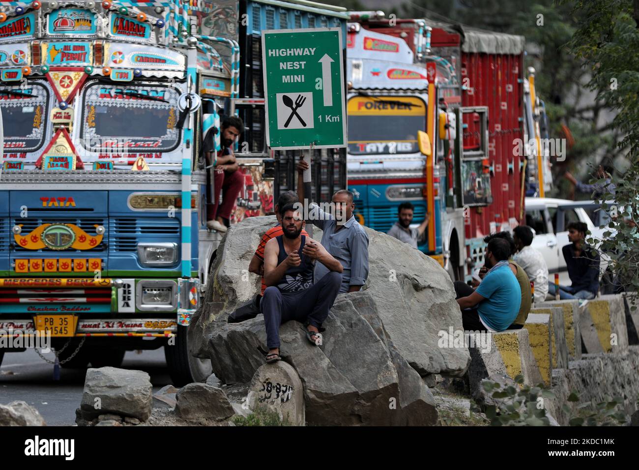 Drivers and Passengers sit on the rocks during Traffic Jam on Srinagar ...