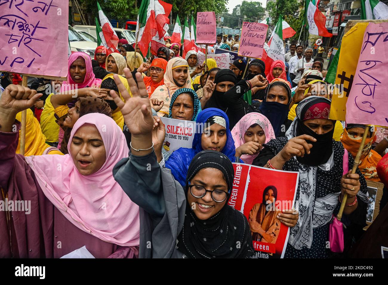 Muslim women shout slogans during a demonstration in support of young ...