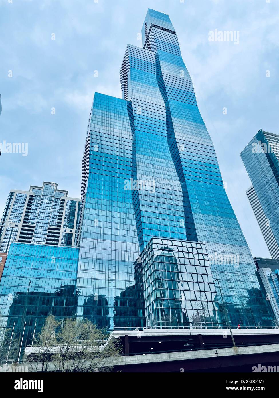 A low angle vertical shot of the wavy building in Chicago, US with blue ...