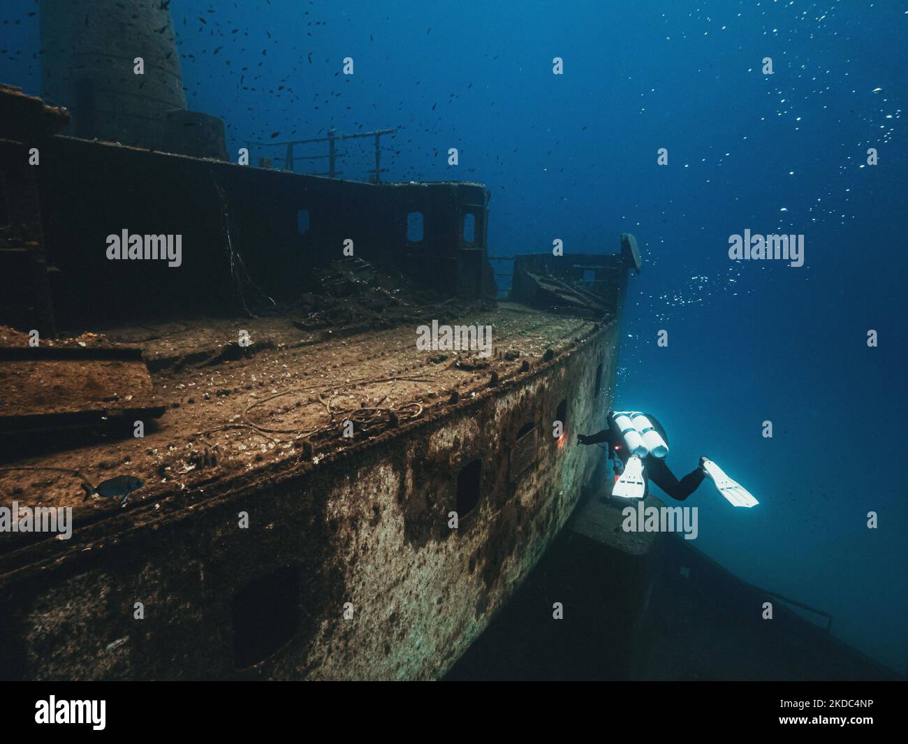 A scuba diver diving on top of wreck, Gozo island, Malta Stock Photo ...