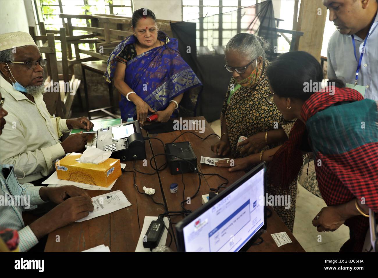 Polling agents check voter identity during Comilla city corporation ...