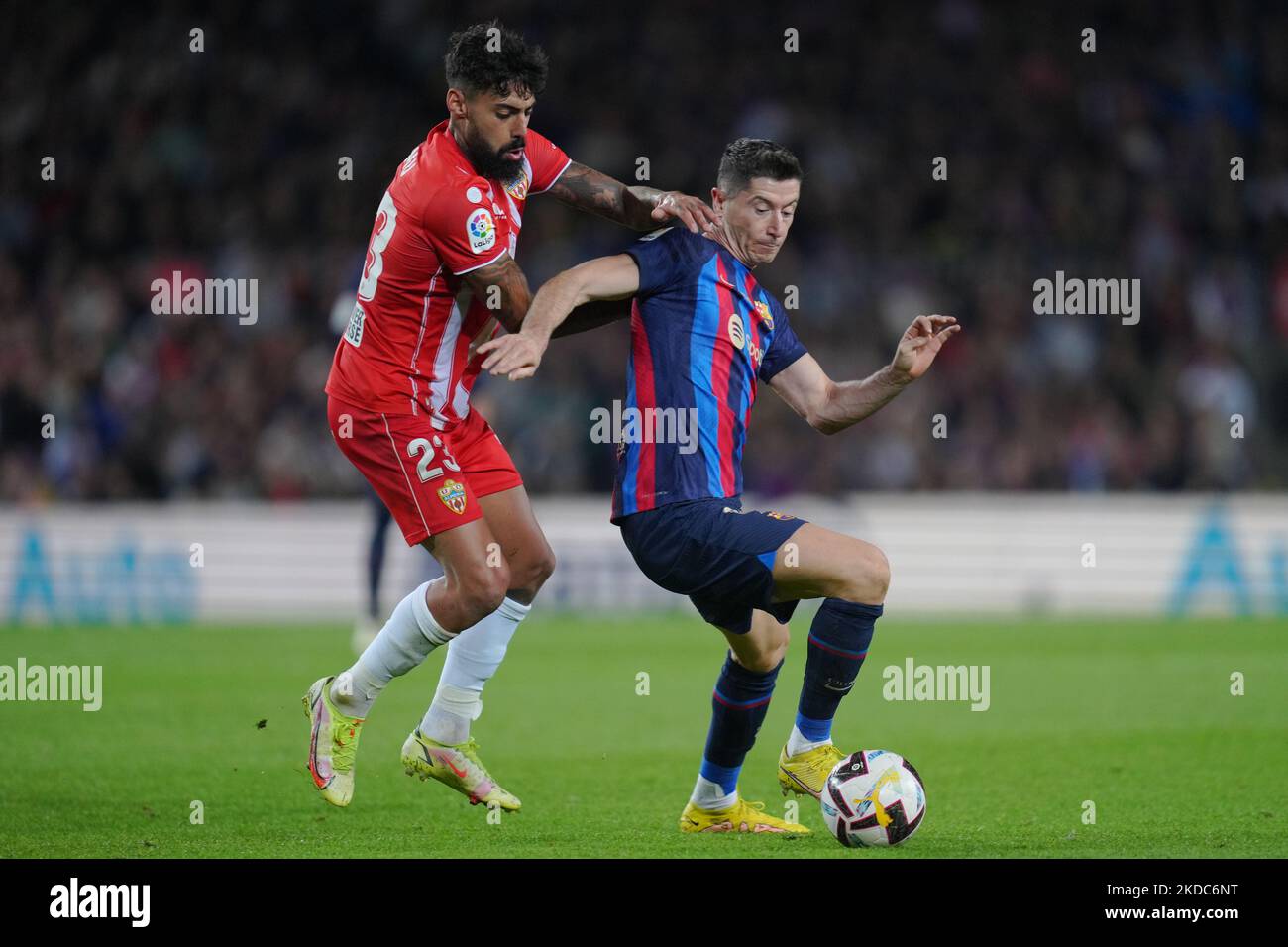 Robert Lewandowski of FC Barcelona and Samuel Costa of UD Almeria ...