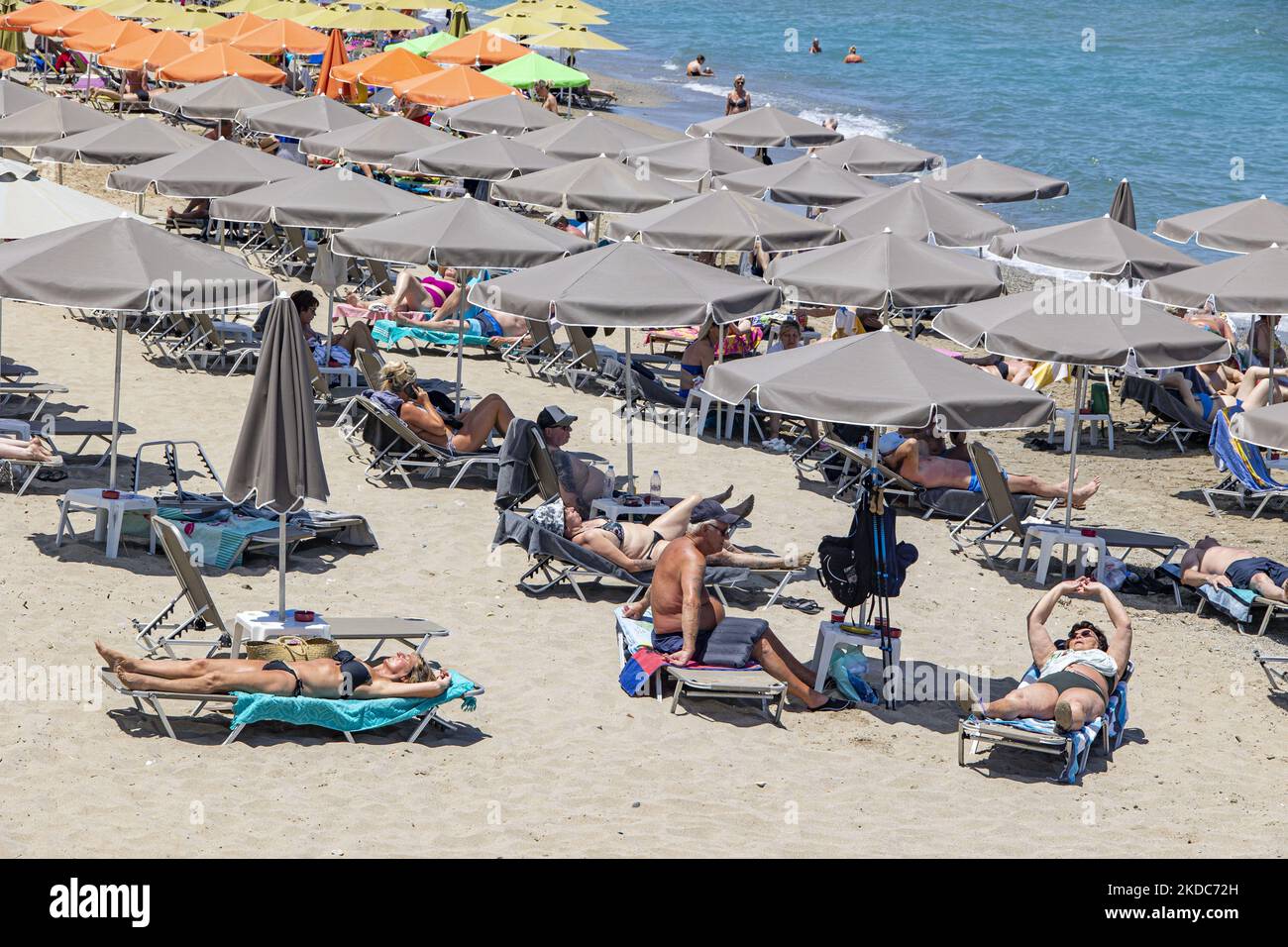 Beautiful greek woman in bikini hi-res stock photography and images - Alamy