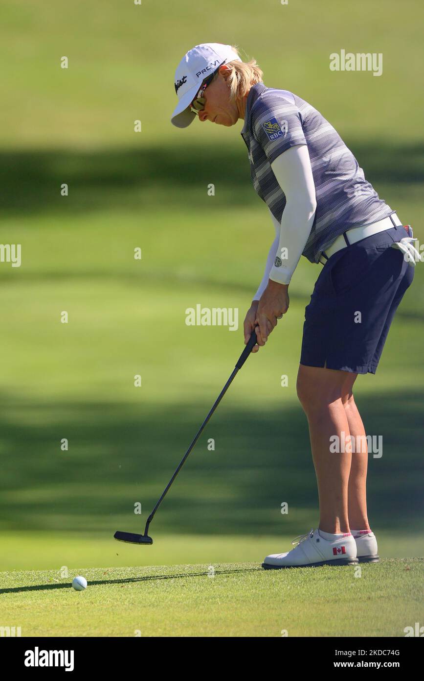 Alena Sharp of Hamilton, Ontario, Canada putts on the 3rd green during ...