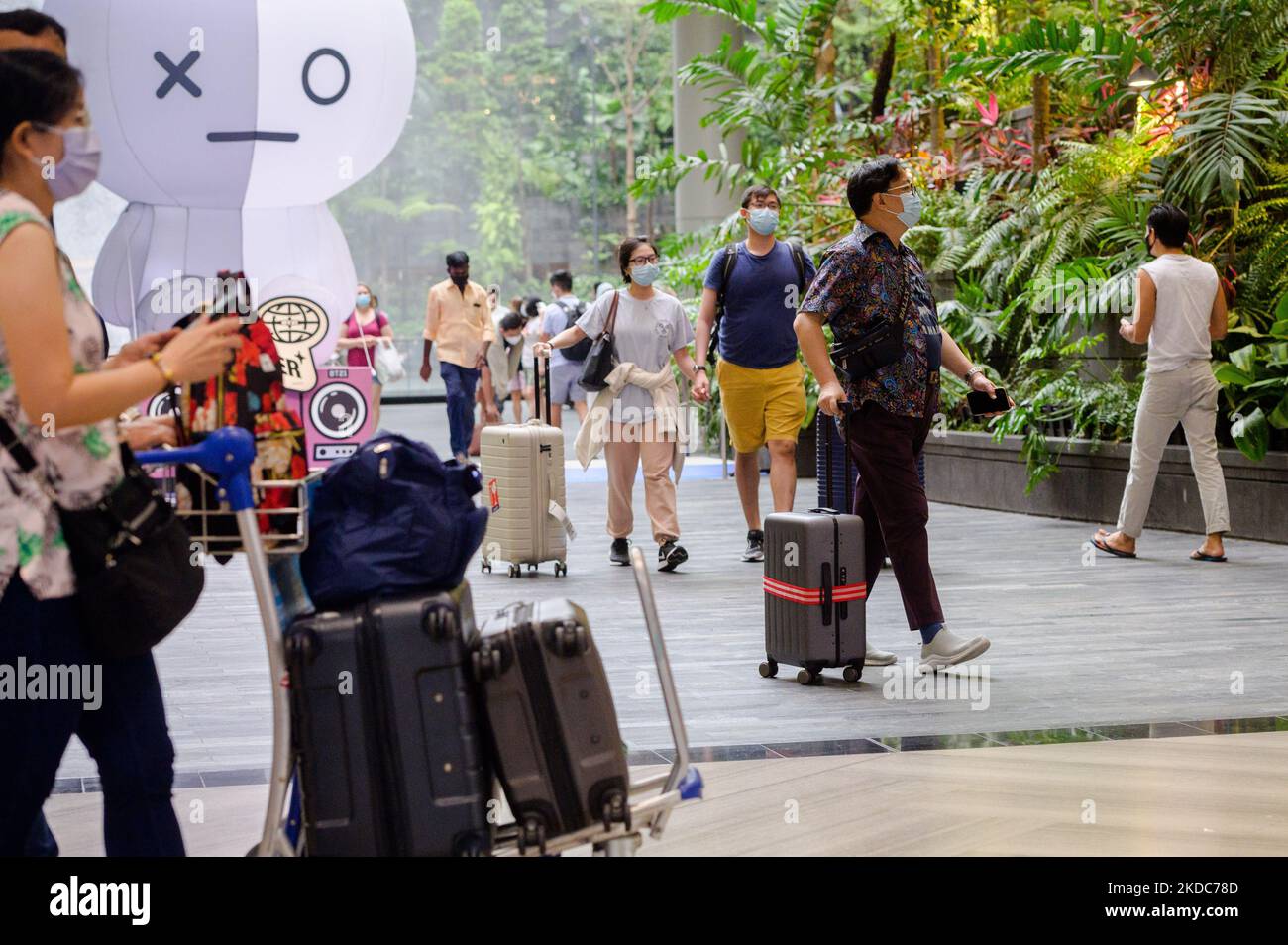 Travellers and visitors in the Jewel Mall of Changi Airport in ...
