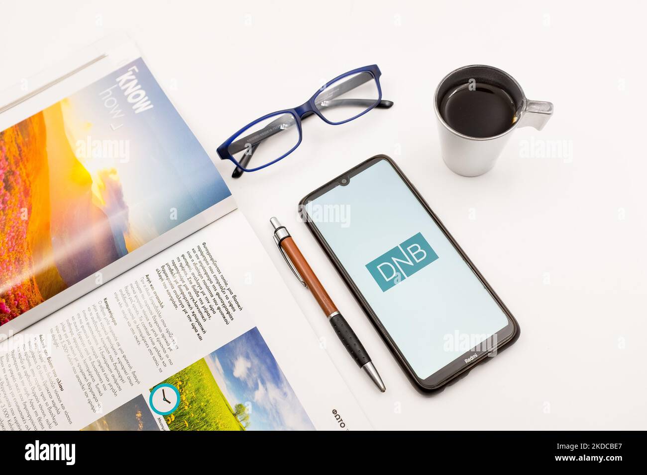 In this photo illustration a DNB ASA logo seen displayed on a ...