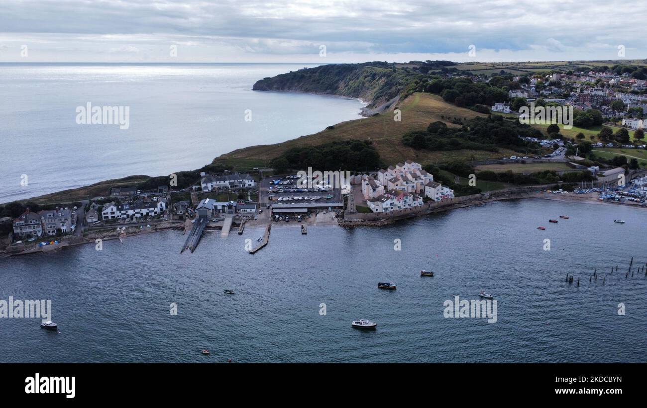 A drone view of coastal town of Swanage, buildings, seaside resort with ...