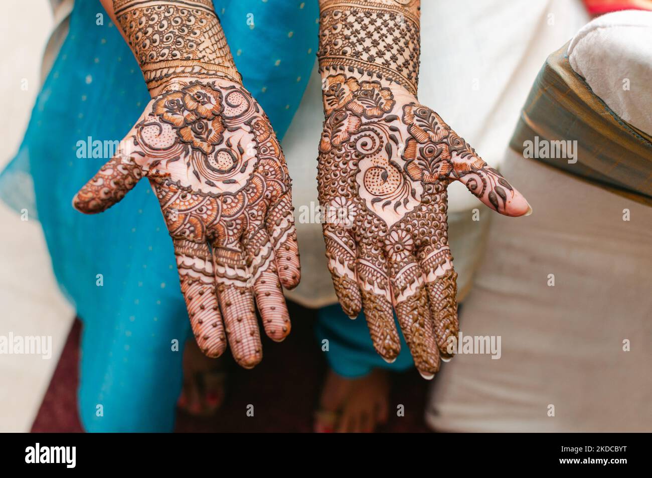 The Indian bride hands painted with henna at traditional ritual during ...