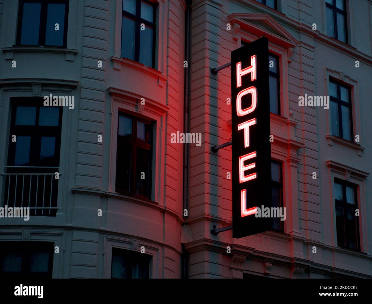 A neon sign of a hotel on the wall Stock Photo - Alamy