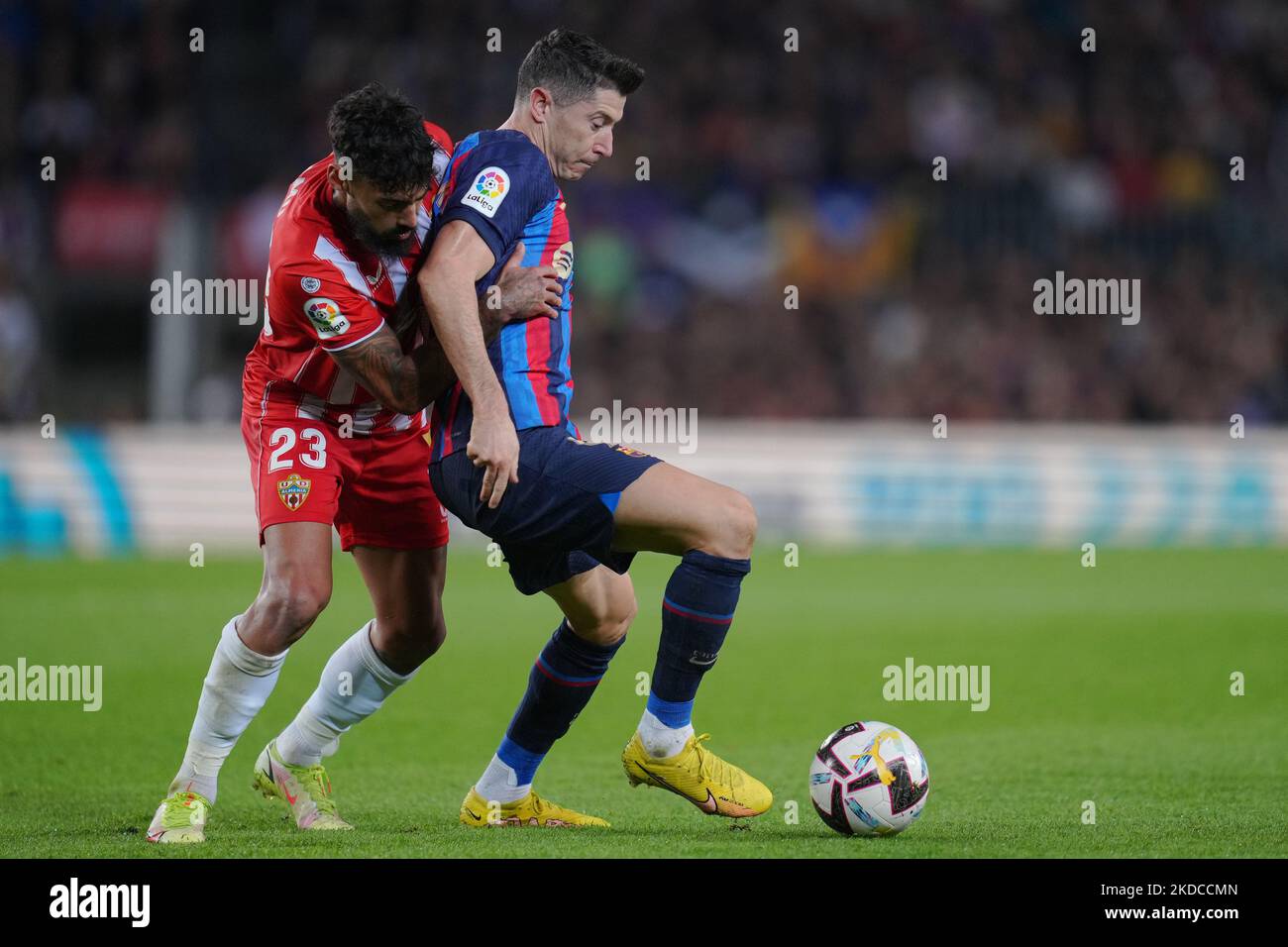 Robert Lewandowski of FC Barcelona and Samuel Costa of UD Almeria ...