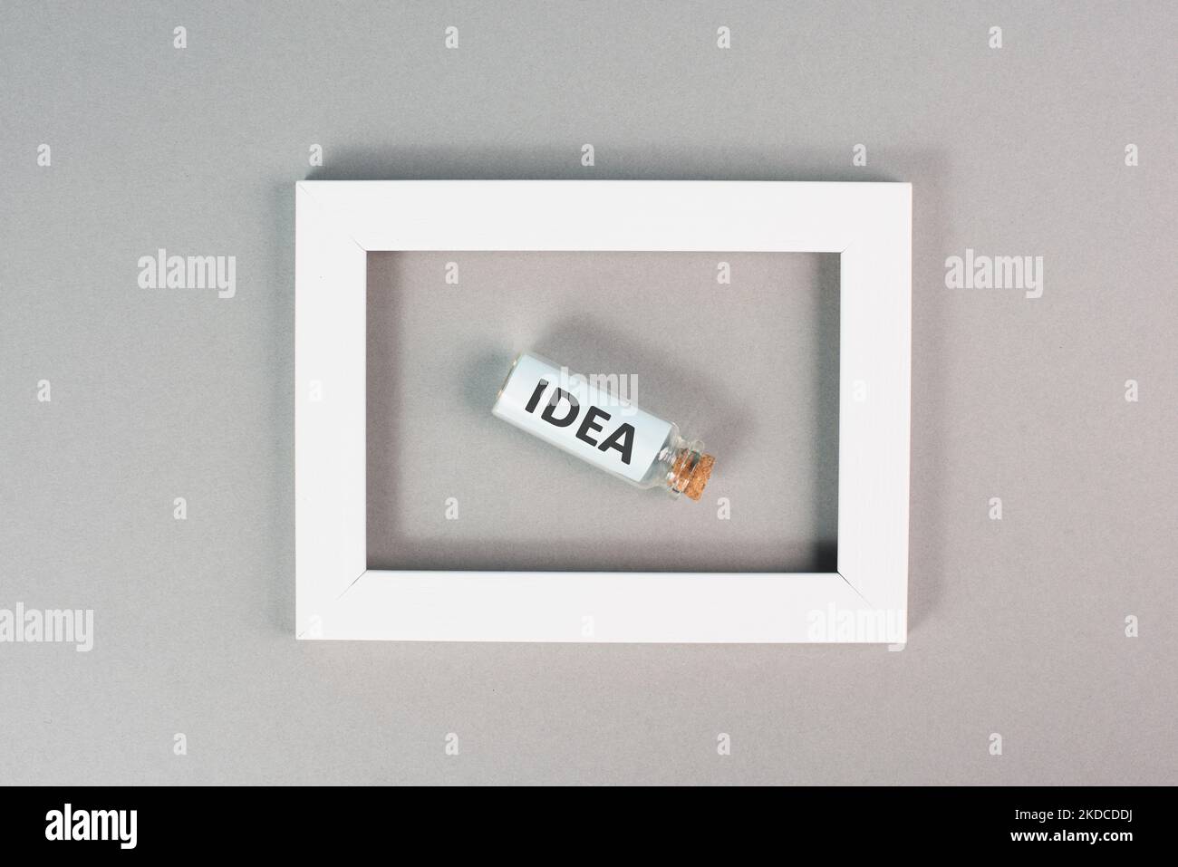 Idea is standing in the glass bottle in the frame, brainstorming ...