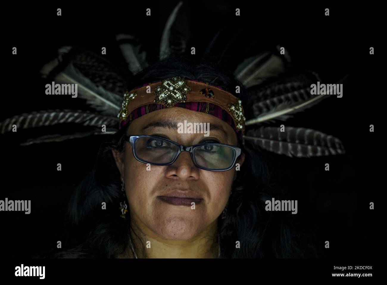 Melisa, a Pipil dancer poses for a picture during a summer solstice ...