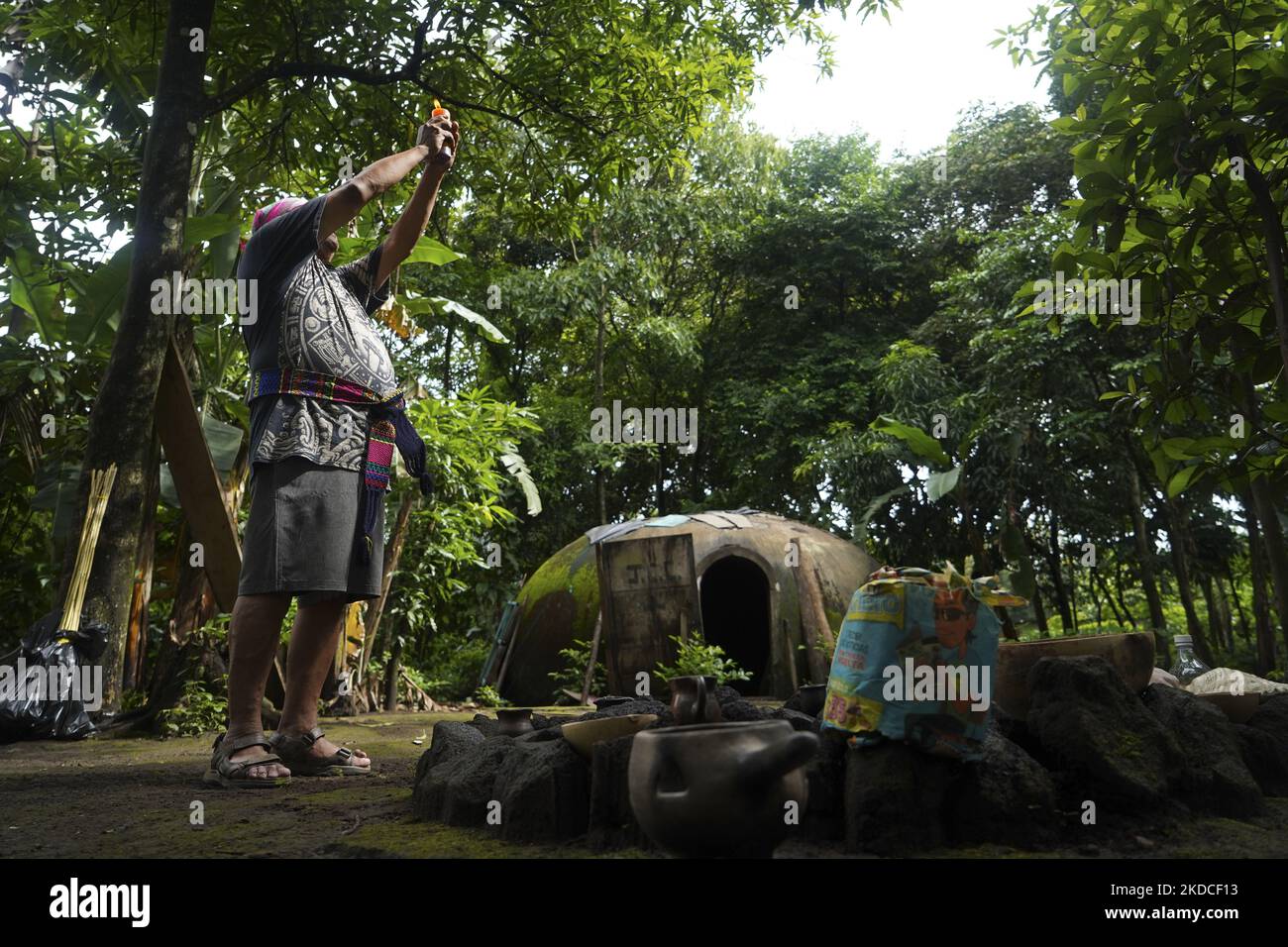Tata Cuyut, a Pipil priest prepares a ritual during a summer solstice ...